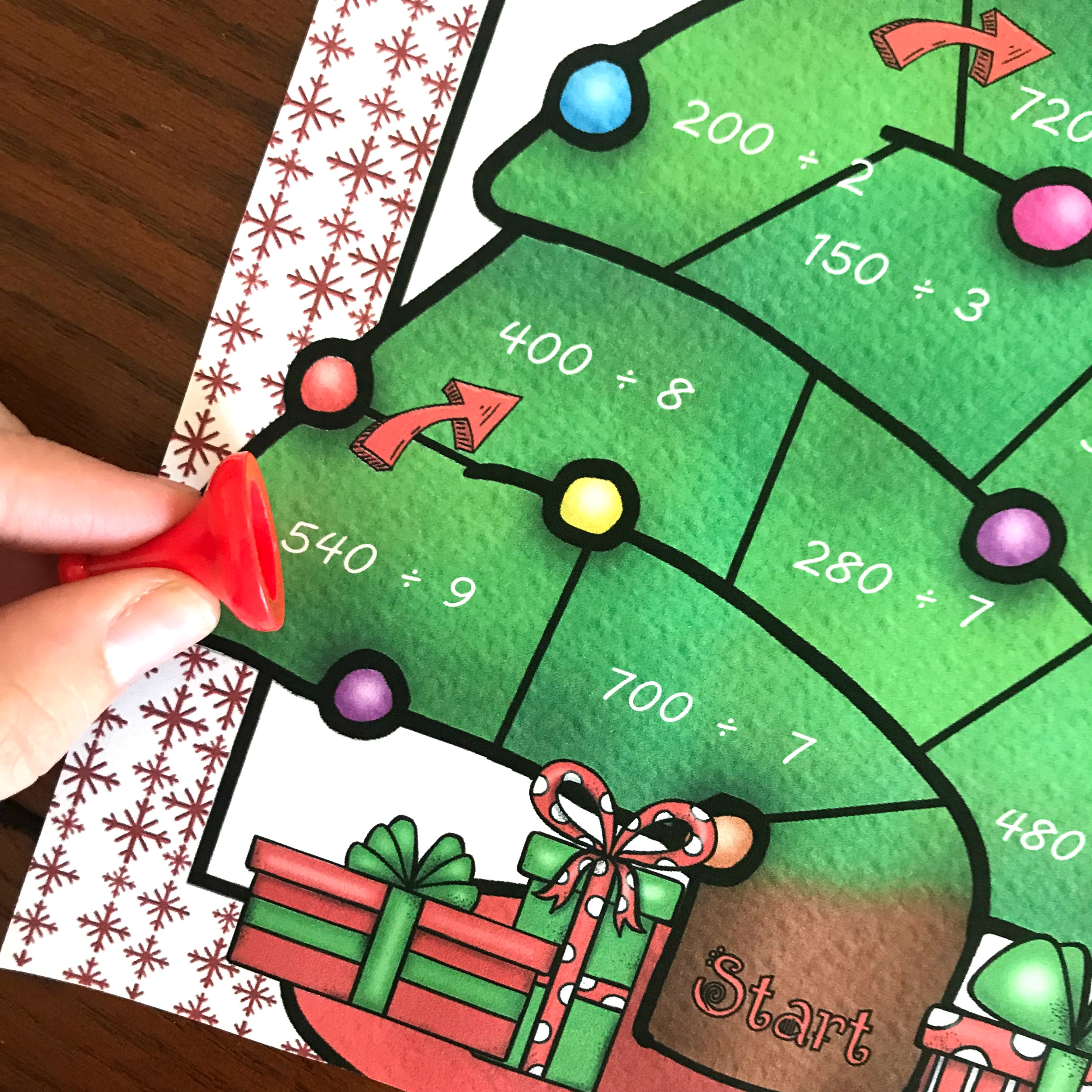 FREE Christmas Game For Dividing Multiples of 10 by a Single Digit
